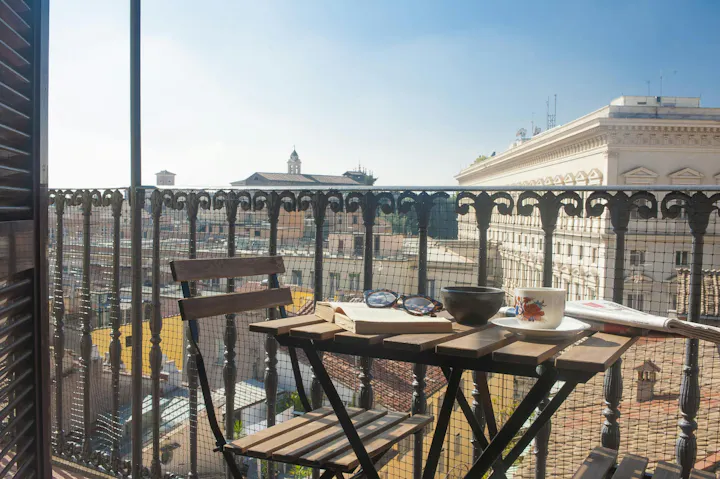 Colosseum Sunset, Monti, Rome | Plum Guide