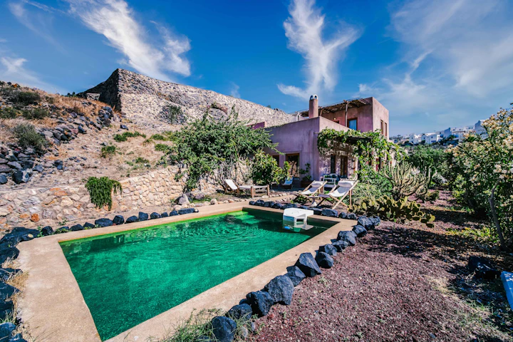 Wrapped in Vines, Santorini, Greece | Plum Guide